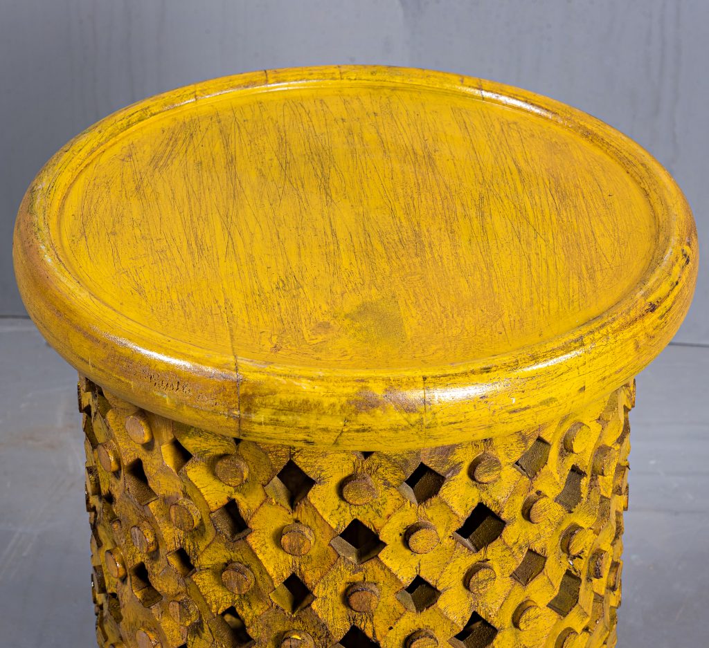 YELLOW CARVED ROUND STOOL - Chisel and Log